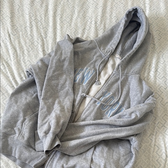 Brandy Melville | Tops | Gray Brandy Zip Up Hoodie With Blue Lettering ...